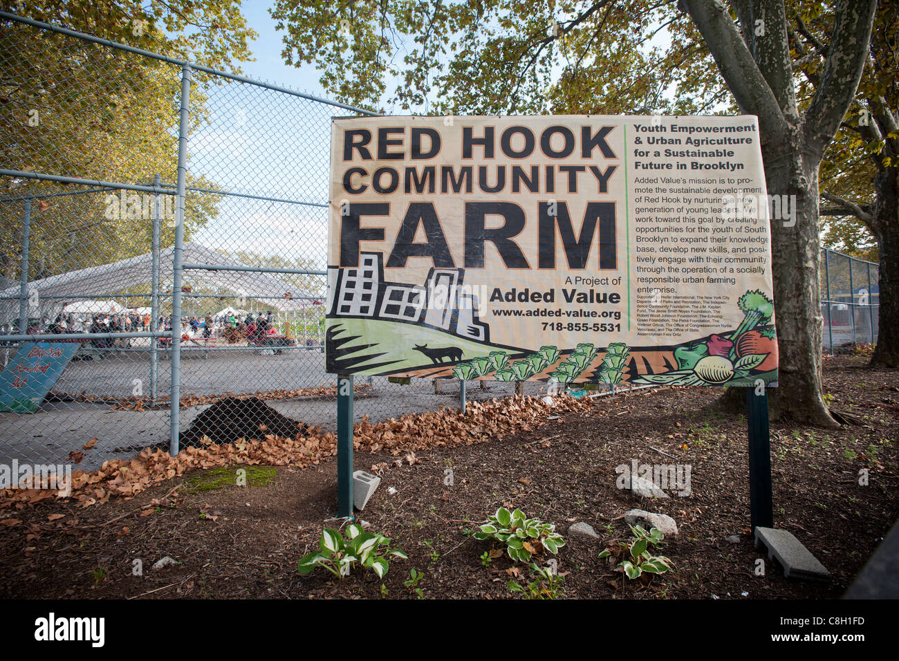 A sign at the entrance to the Red Hook Community Farm in Brooklyn in ...