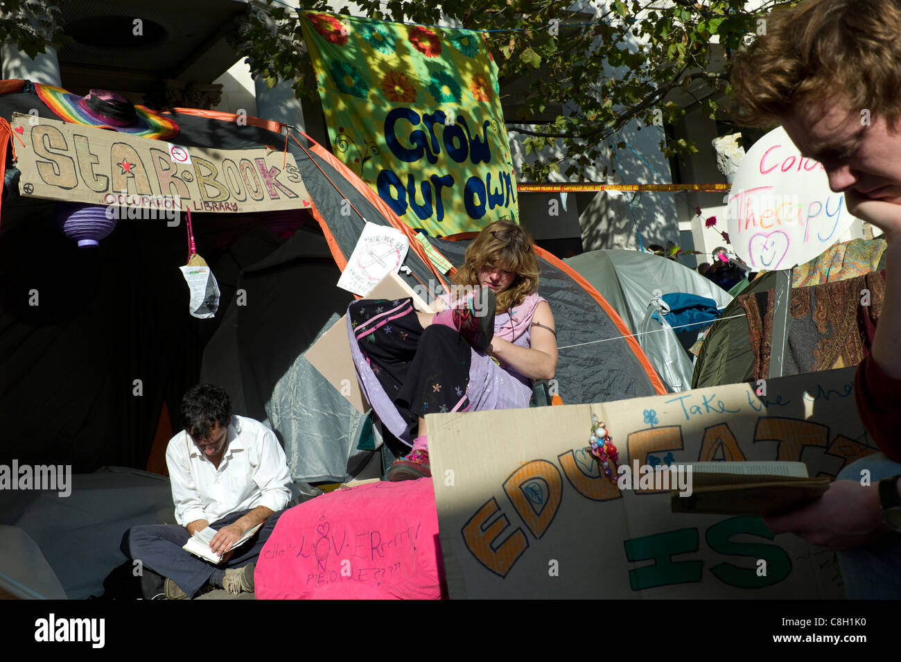 Tents with slogans and banners at the anti Capitalist protest St.Paul's ...