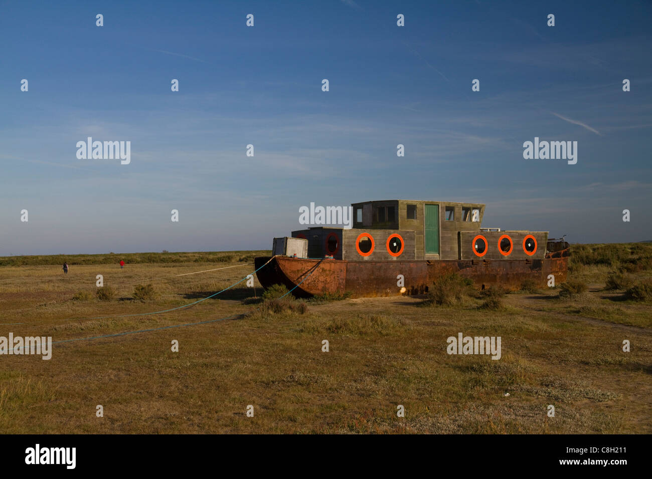 A strange-looking boat on marshland near the Agar Creek at Blakeney in ...