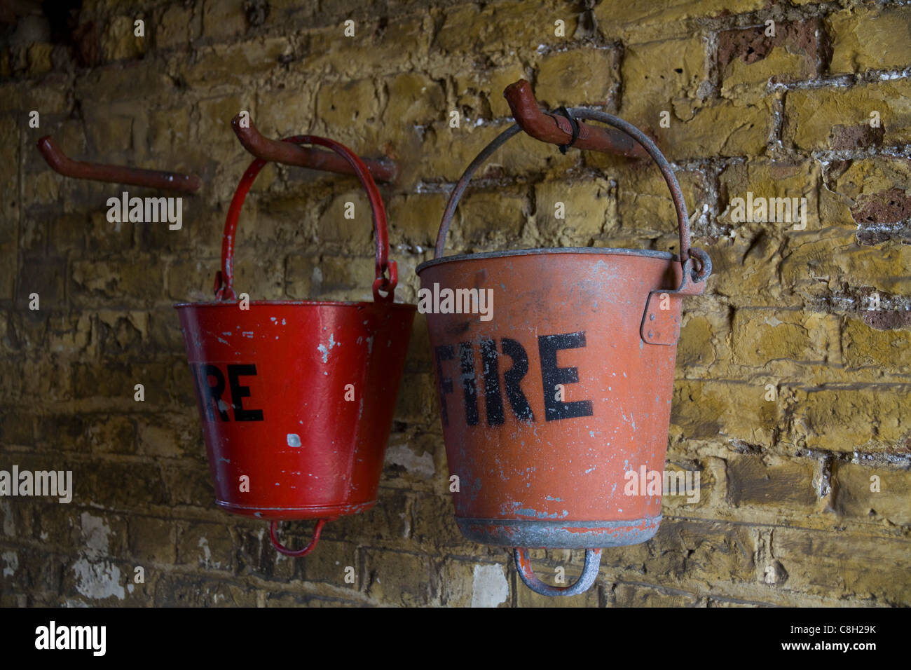 Old fire buckets hang from pegs on the walls at Landguard Fort ...