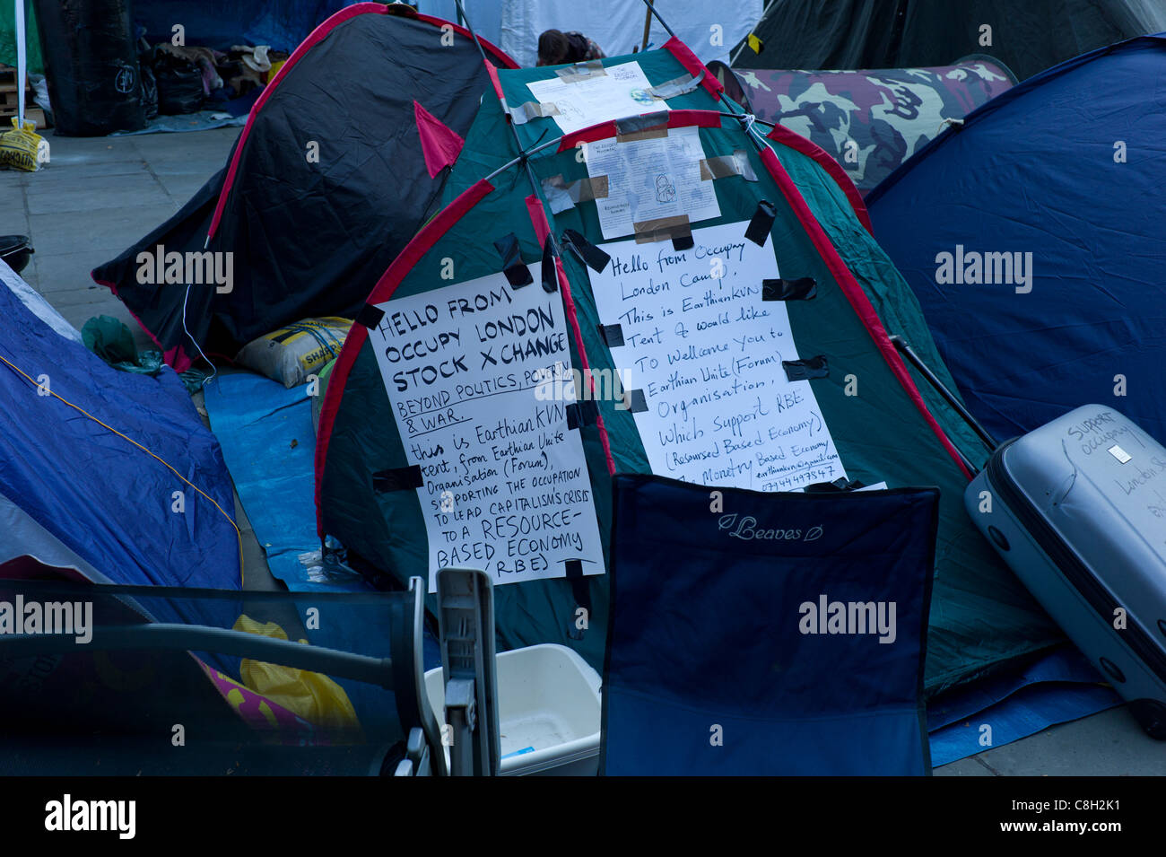 Tents with slogans and banners on at the anti Capitalist protest St ...