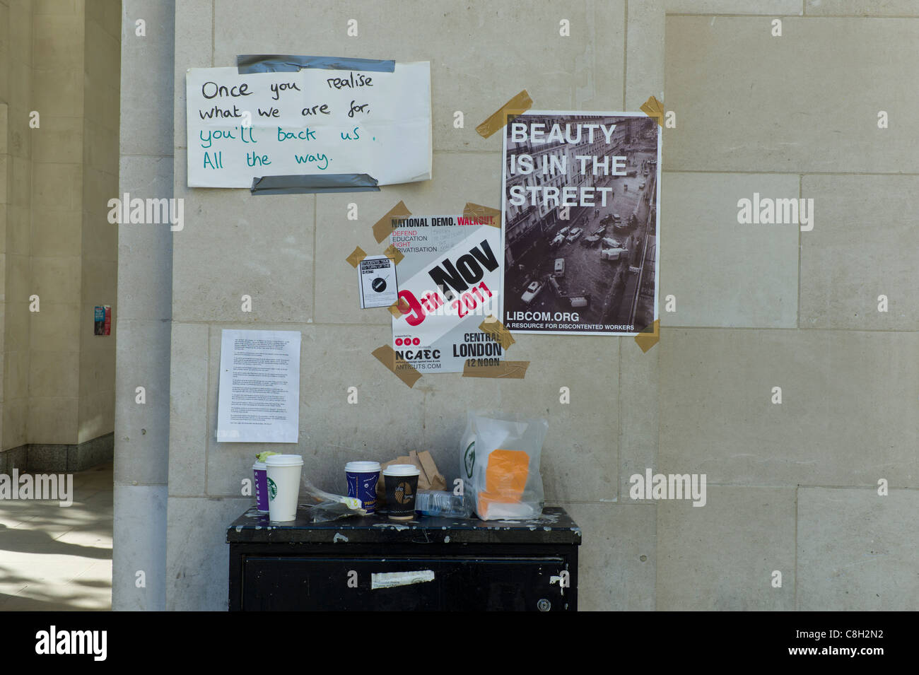 Banners, or, placards, or slogans or protesters at the anti Capitalist ...