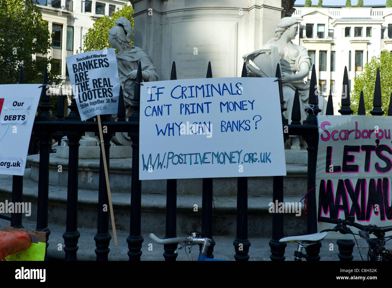Placards, or banners, or posters at the Anti Capitalist protest St.Paul ...