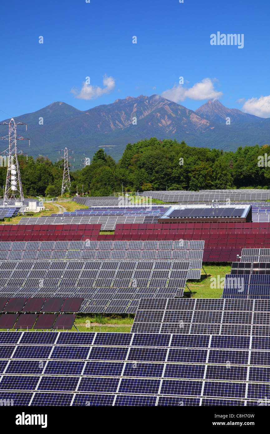 Photovoltaic power plant and mountain Stock Photo - Alamy