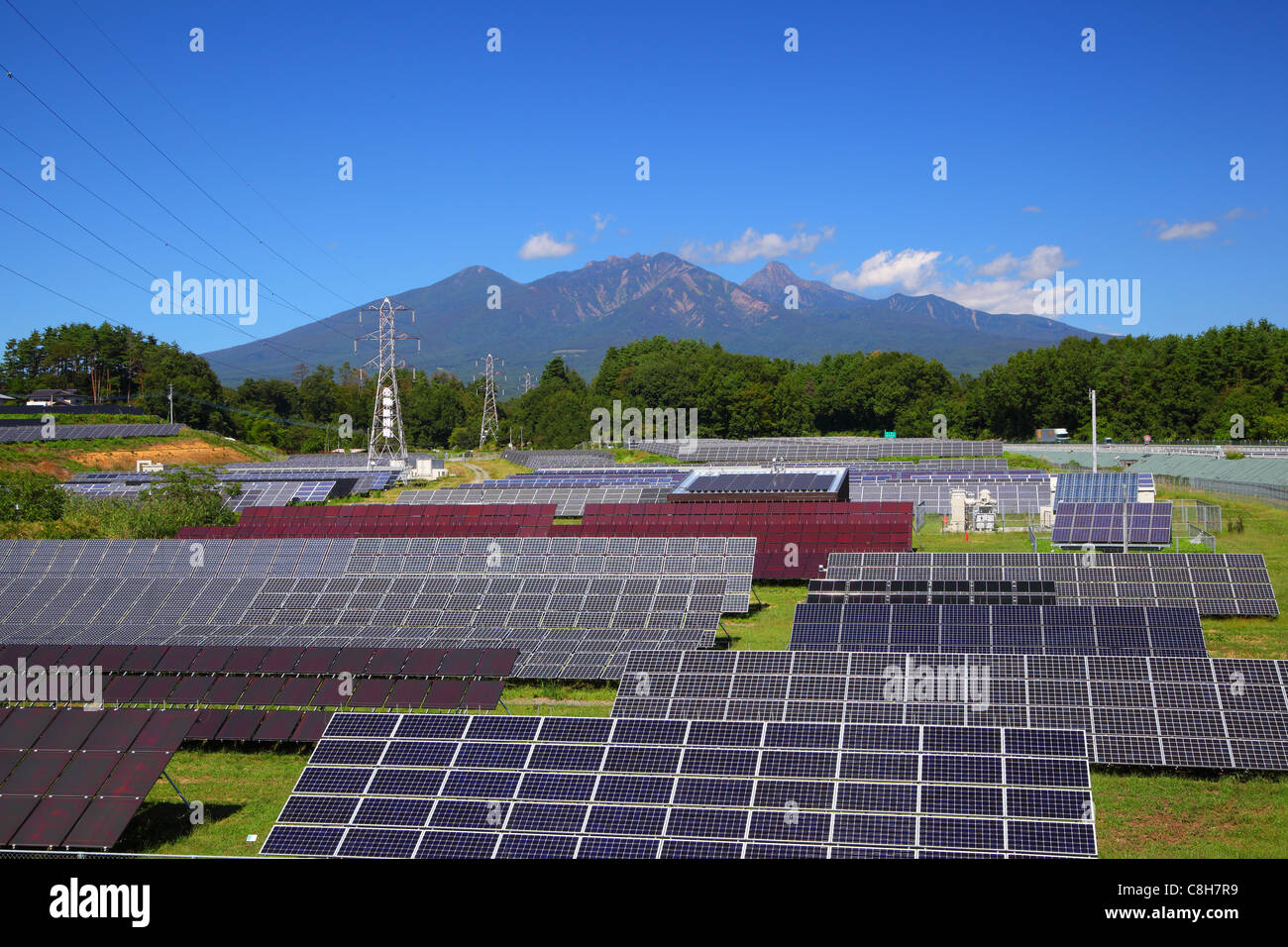 Photovoltaic power plant and mountain Stock Photo - Alamy
