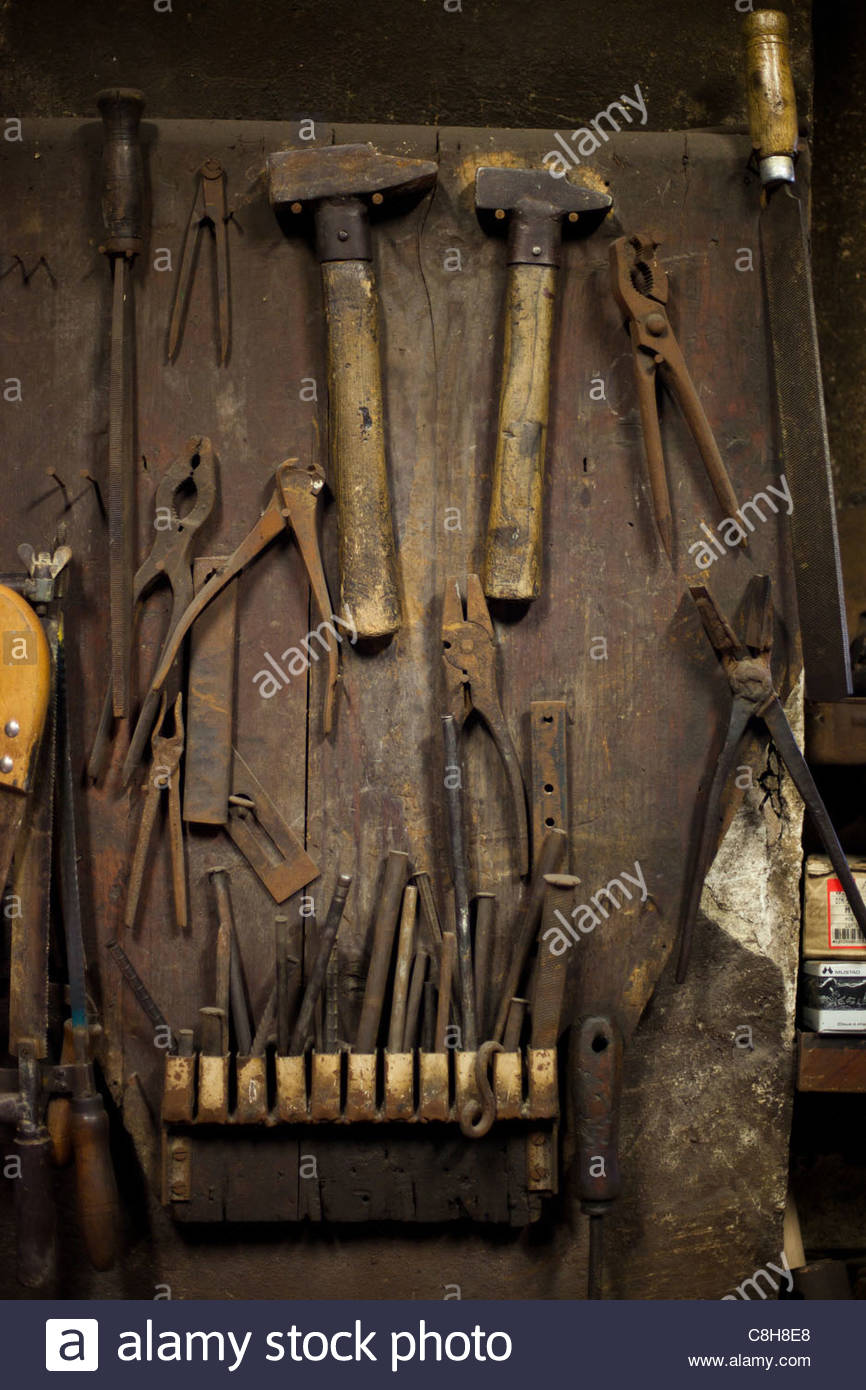 A blacksmith's wall Stock Photo - Alamy