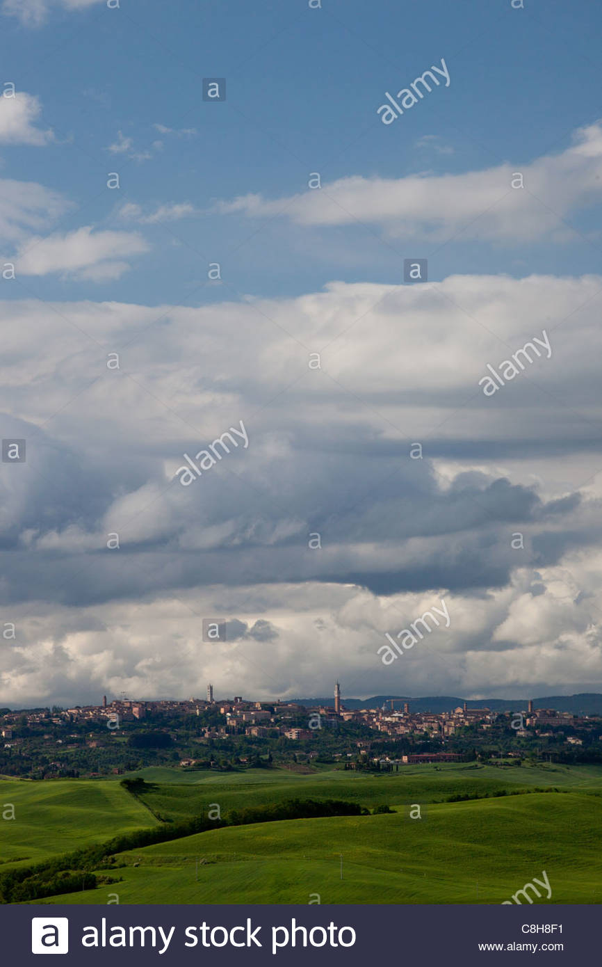 Siena under a spring sky Stock Photo - Alamy