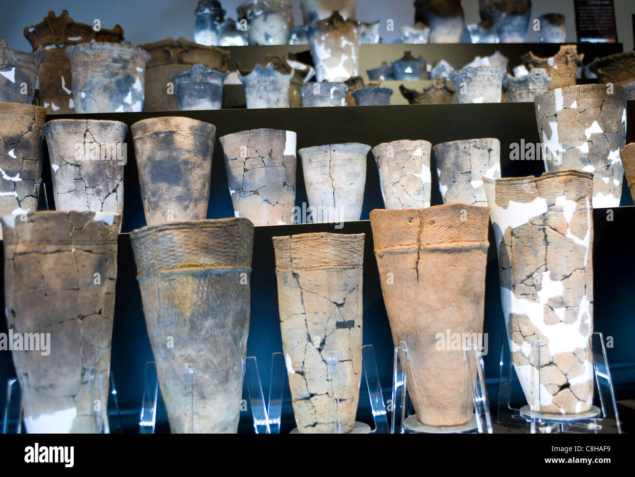 Photo shows examples of Jomon pottery inside the Sanmaru Museum, which ...