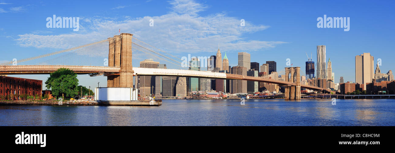 Brooklyn Bridge with lower Manhattan skyline panorama in the morning ...
