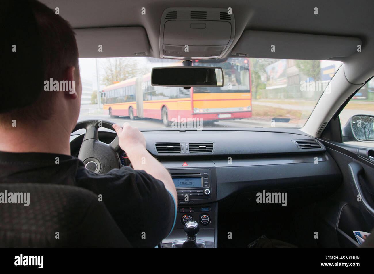 man in the car on a busy road Stock Photo - Alamy
