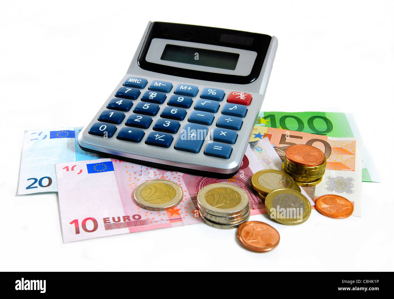 Calculator and Euro money on white background Stock Photo - Alamy