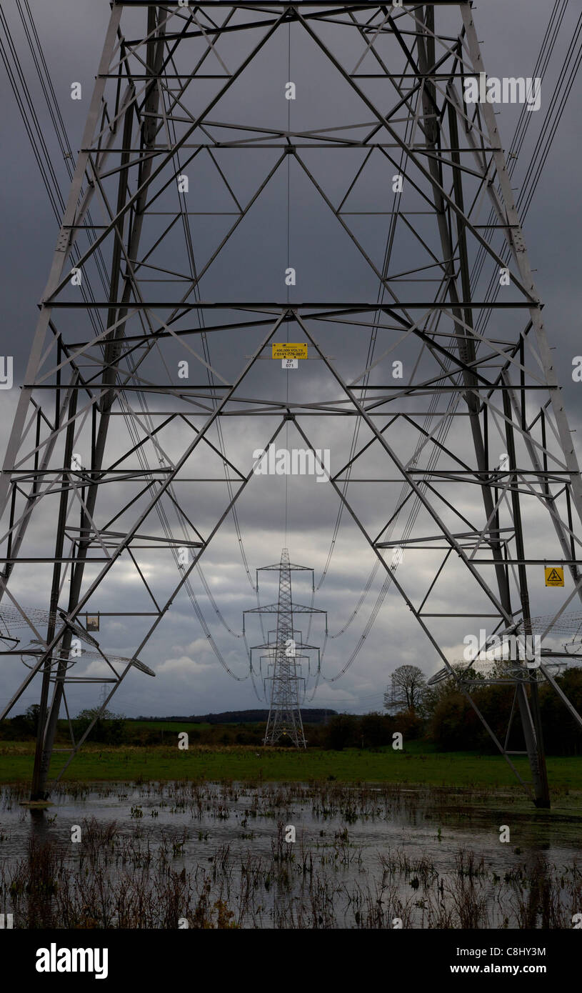 ELECTRICITY PYLONS ON A STORMY DAY Stock Photo - Alamy