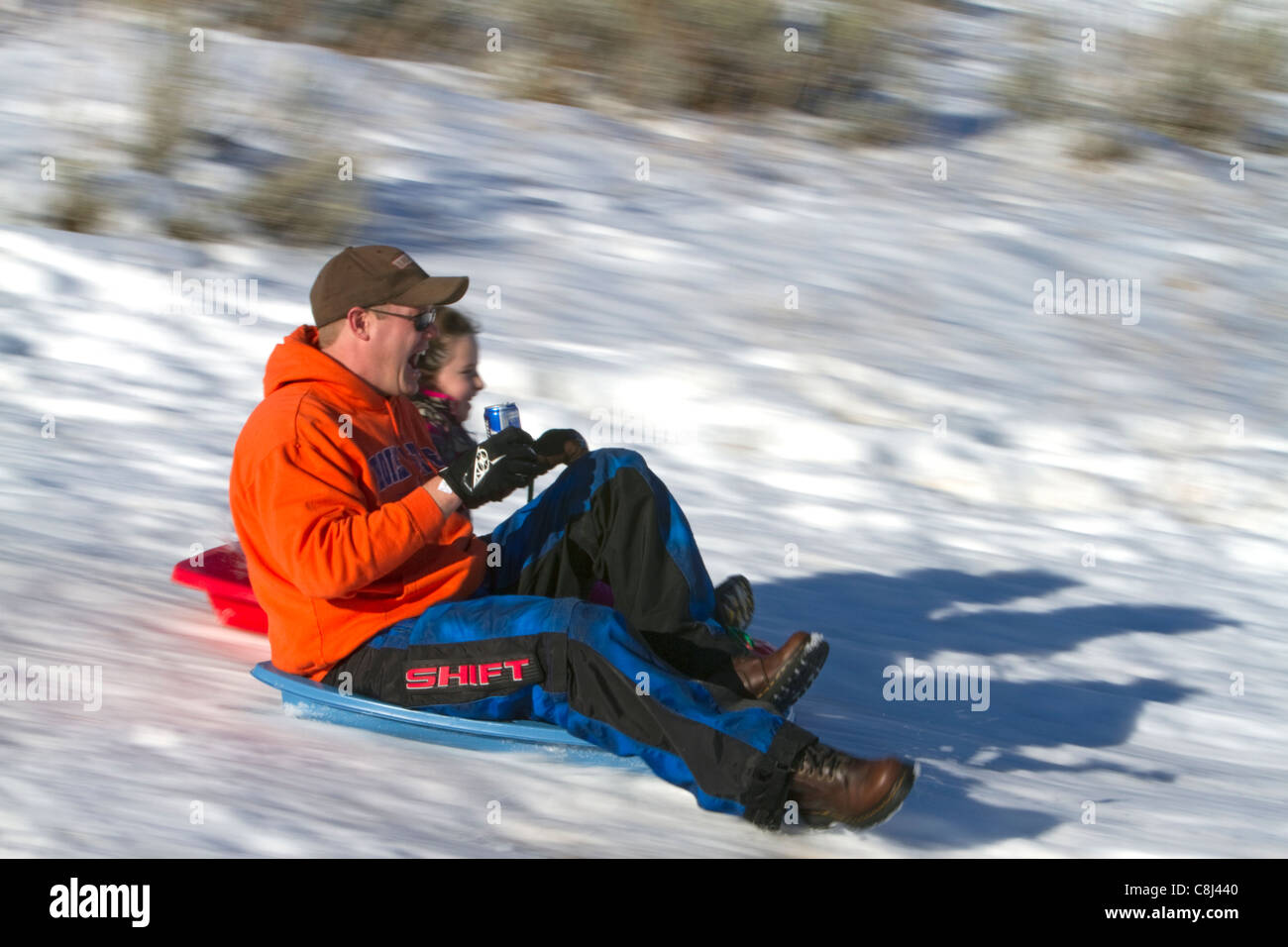 Sledding on a snowy hill near Boise, Idaho, USA Stock Photo - Alamy