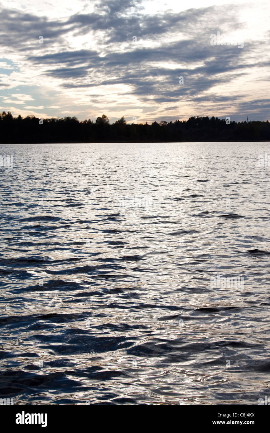 Grey Ripples on a Lake and Clouds in a Sky Stock Photo - Alamy