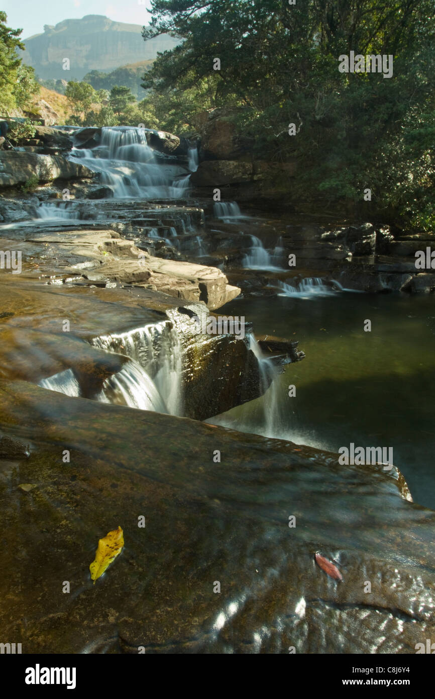 Waterfall flowing in the Drakensberg mountains Stock Photo - Alamy