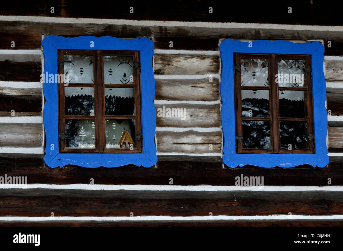 Windows in old wooden farming houses Stock Photo - Alamy