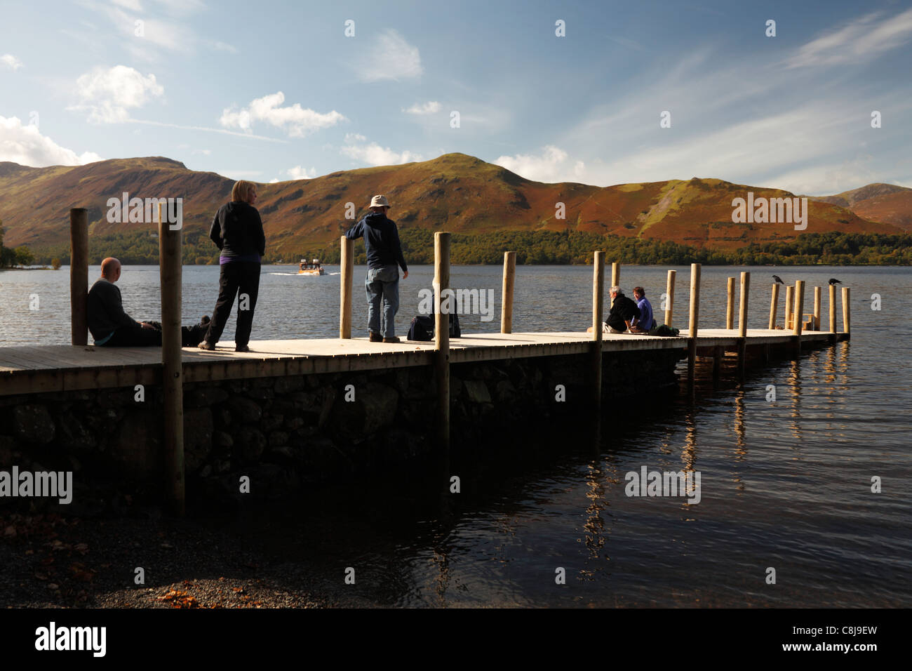 Tourists waiting on jetty for [ferry boat], "Derwent Water", Borrowdale ...