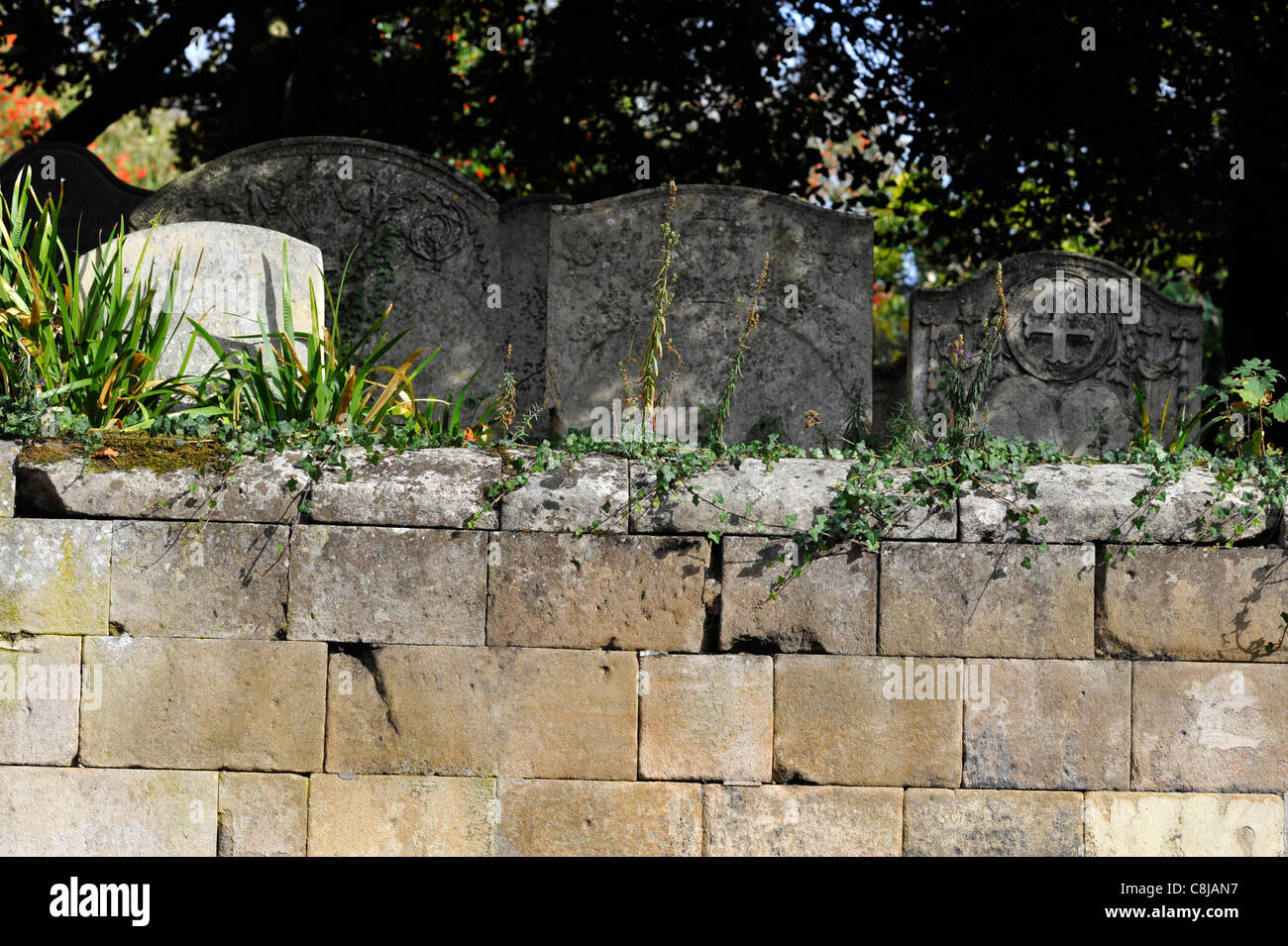 A stone cemetery wall in Stamford, England Stock Photo - Alamy