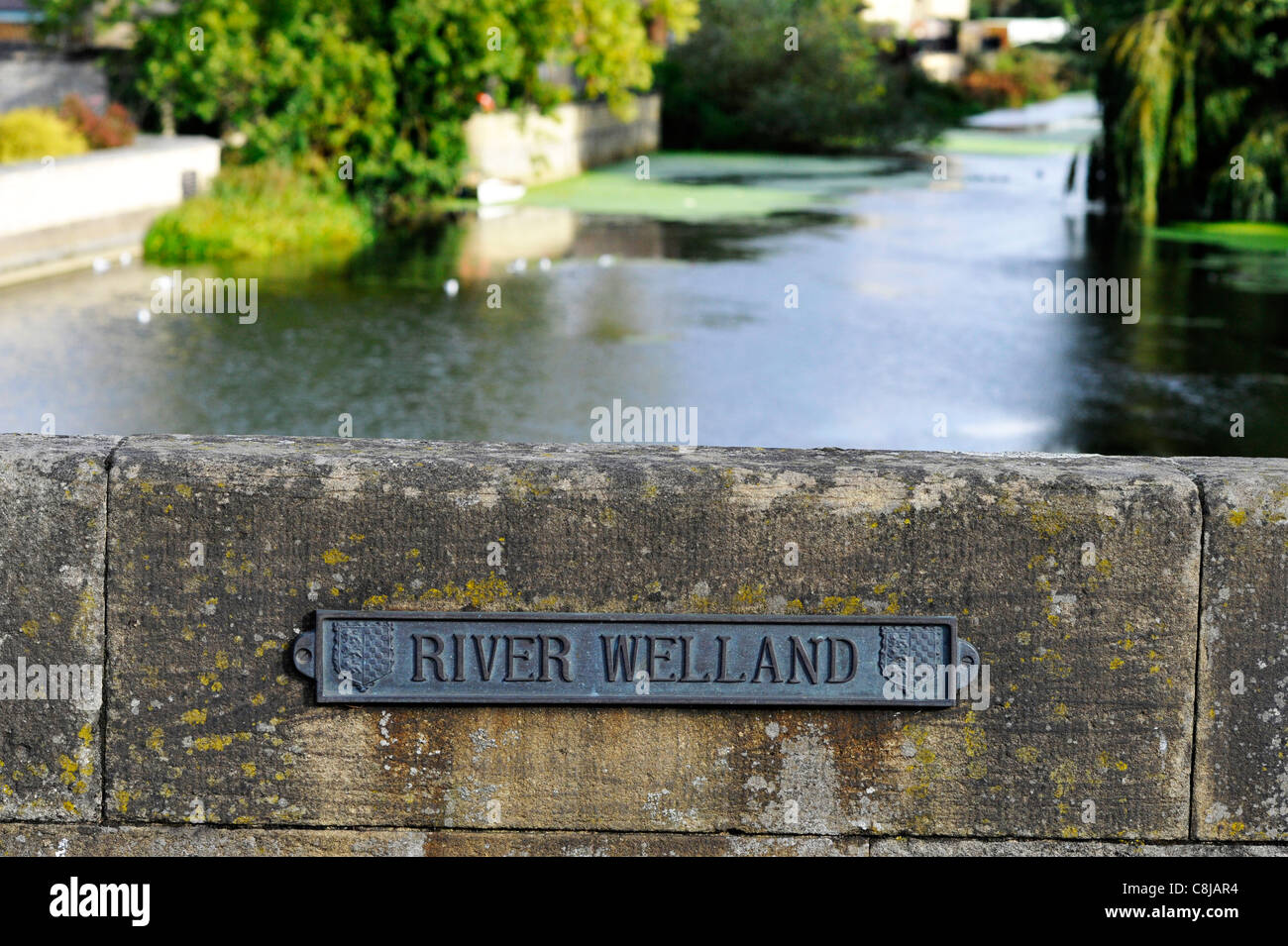 The River Welland sign over the River at Stamford. England Stock Photo ...
