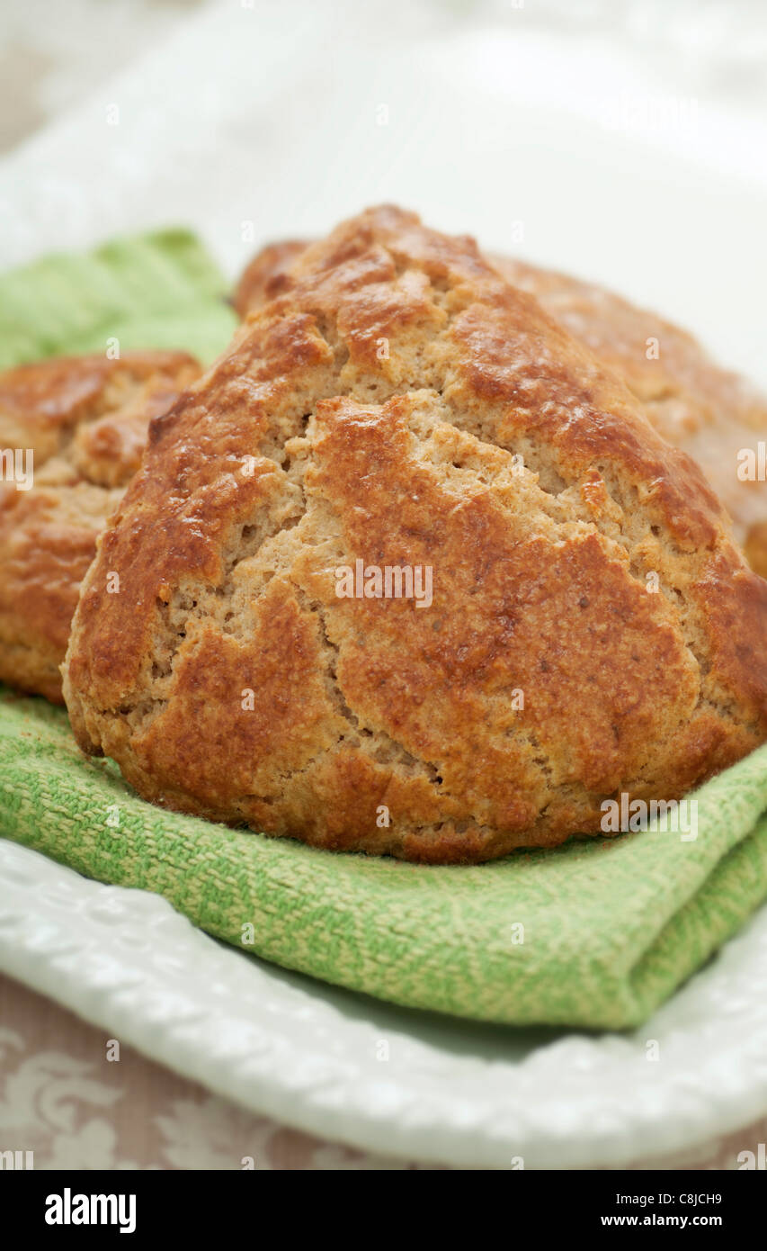 Scones on a white ceramic platter Stock Photo - Alamy