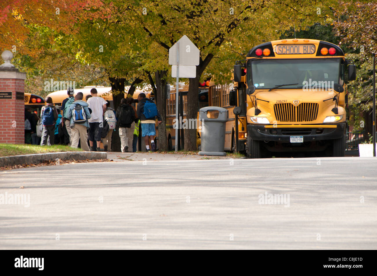 School buses loading students Stock Photo - Alamy