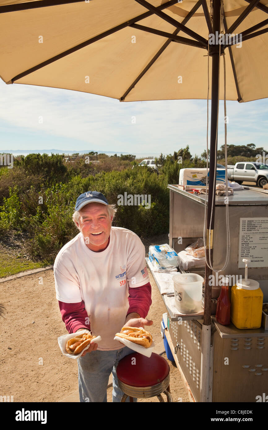 Bill Connell serves a variety of hot dogs at Surf Dog, Carpinteria ...