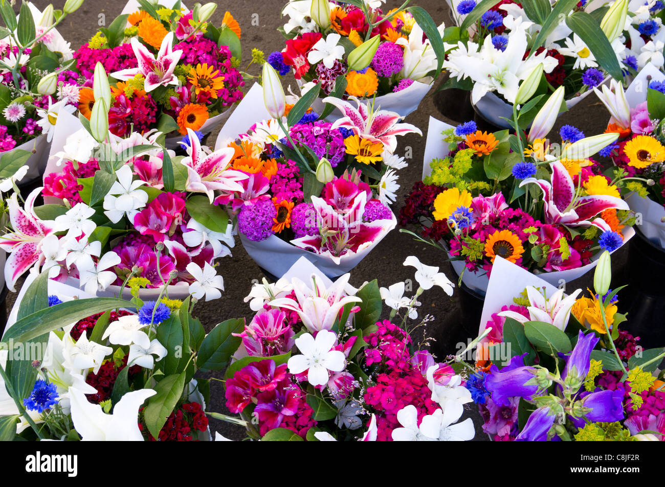 Flower bouquets on display at market Stock Photo - Alamy