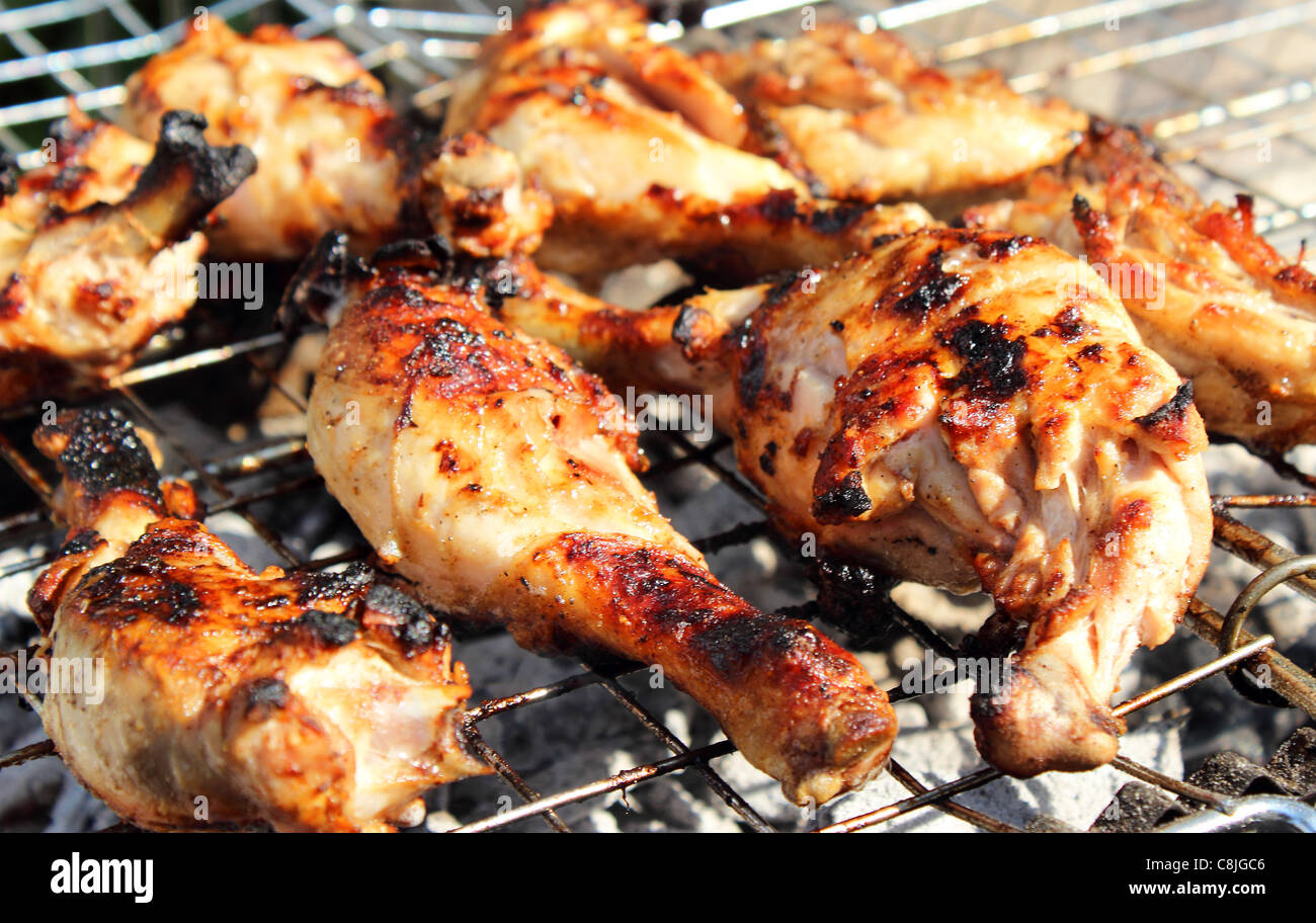 Chicken on grill Stock Photo - Alamy