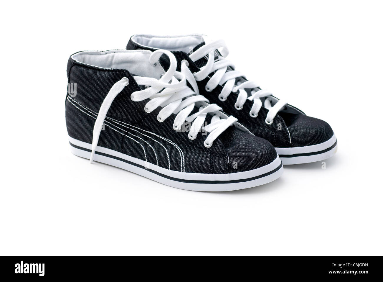 Brand new white sneakers Cut Out Stock Images & Pictures - Alamy