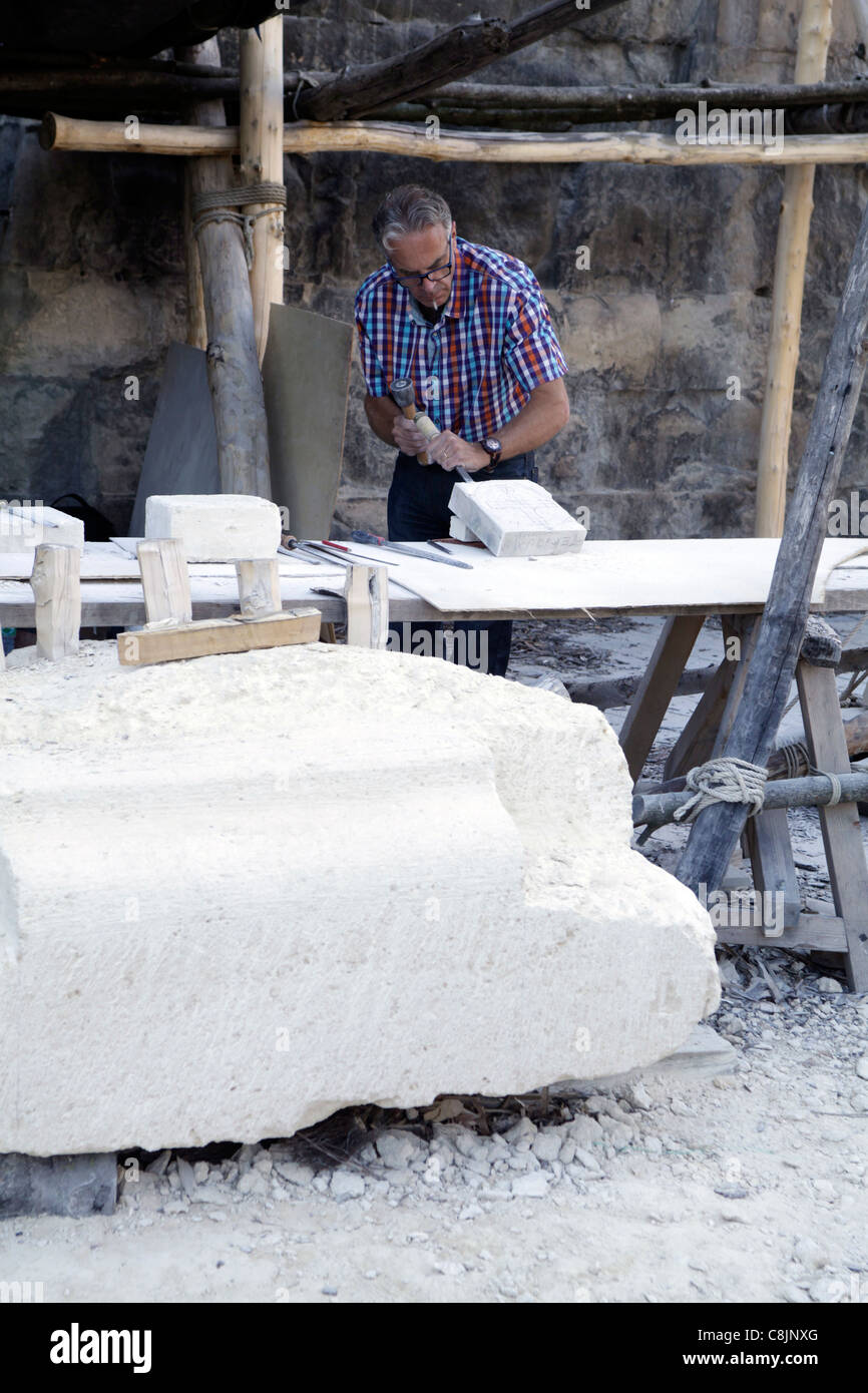Stonemason working on the renovation of Reims Cathedral in France Stock ...