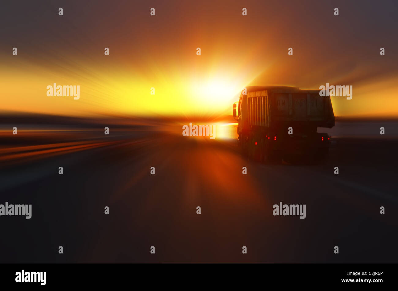 truck at sunset highway Stock Photo - Alamy