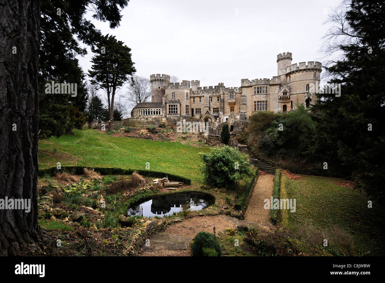Gardens with pond, archway and steps at Devizes Castle, Wiltshire UK ...