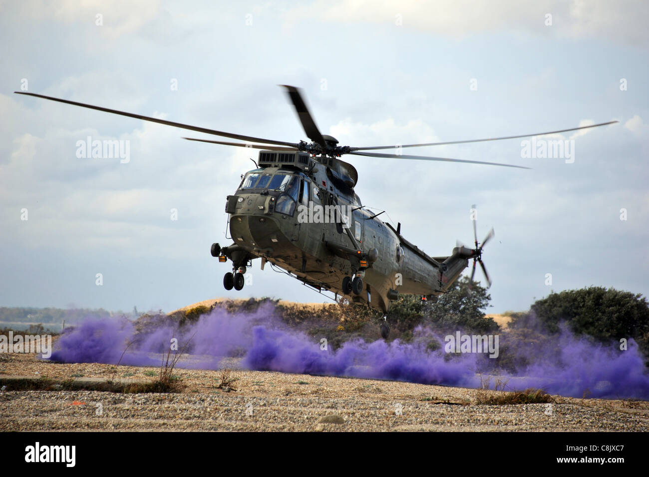 Sea King helicopter during beach assault training Stock Photo - Alamy