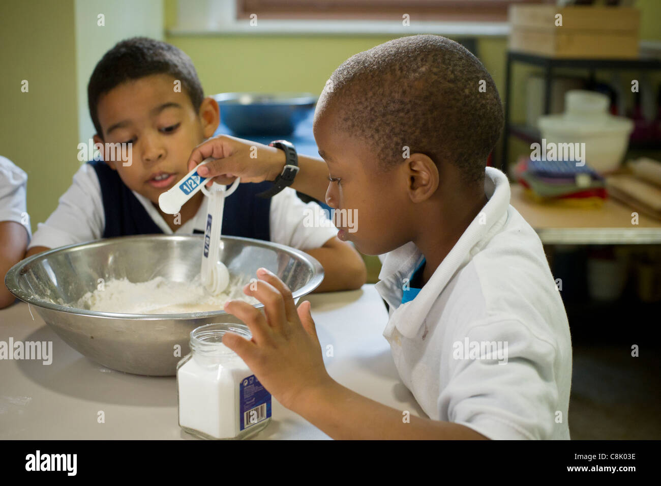 Second and third graders participate in a Plant Part Pizza cooking ...