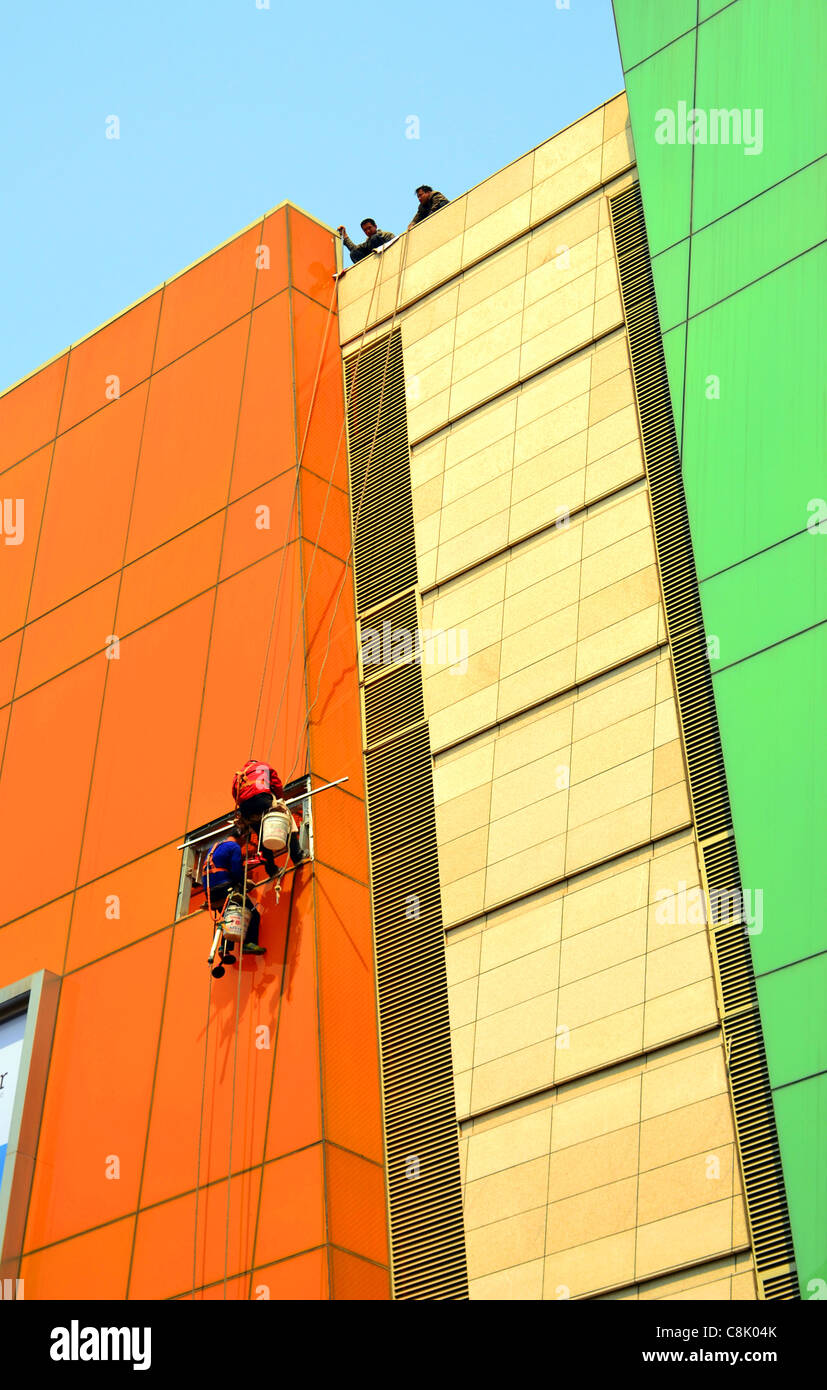 Repair of a colorful facade Stock Photo - Alamy