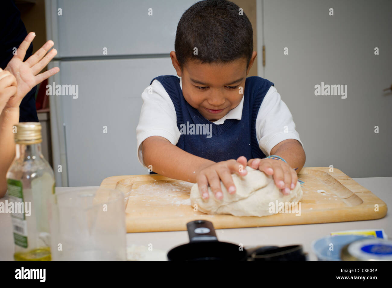 Second and third graders participate in a Plant Part Pizza cooking ...