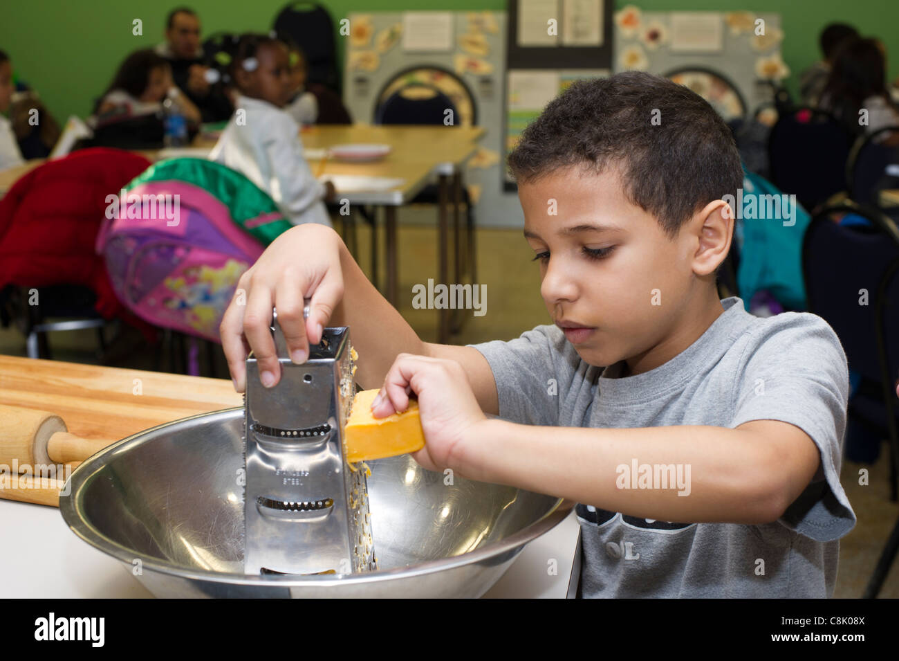 Second and third graders participate in a Plant Part Pizza cooking ...