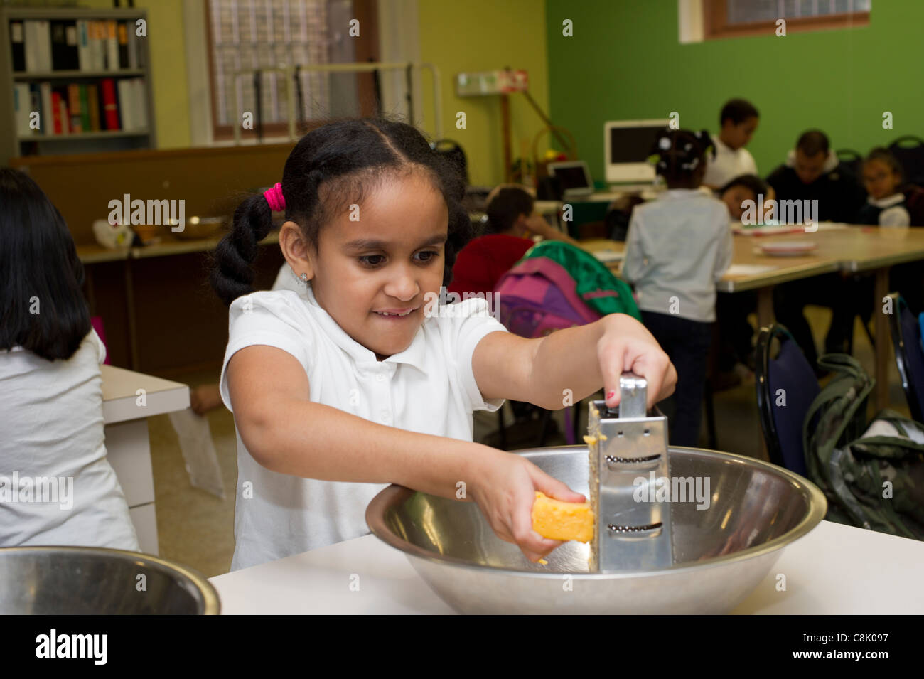 Second and third graders participate in a Plant Part Pizza cooking ...
