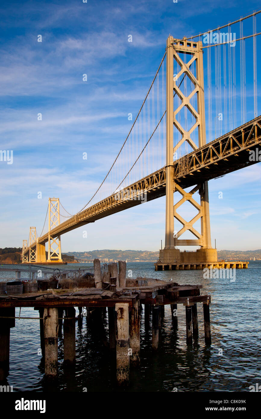 Old dock pilings below the Bay Bridge in San Francisco California USA ...