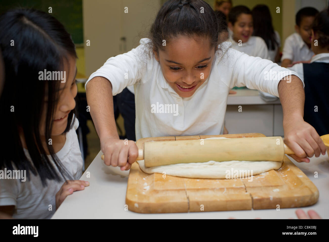 Cooking school children pizza dough hi-res stock photography and images ...