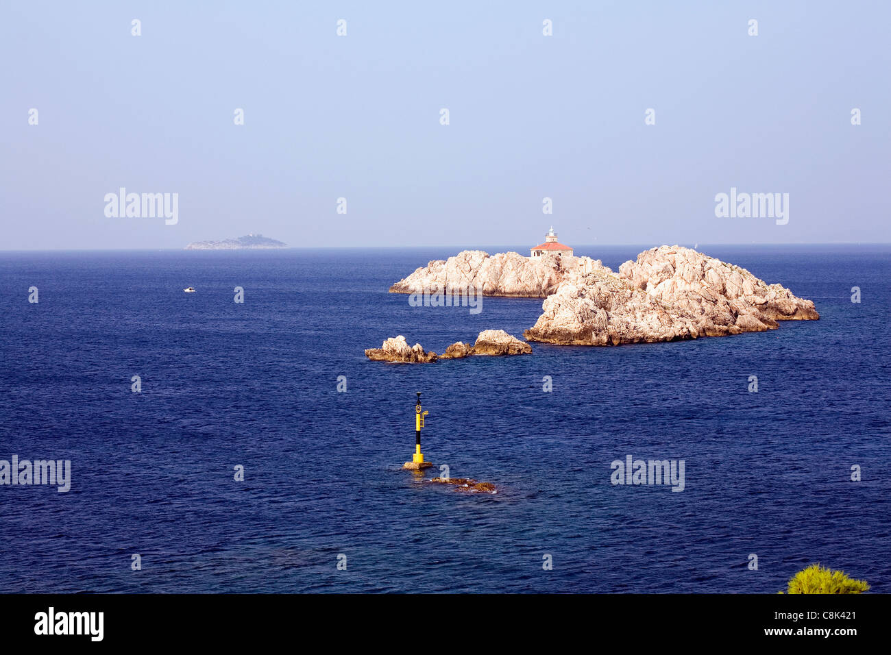 Small islets and lighthouse Masarykov Put near Lapad Dubrovnik Croatia ...
