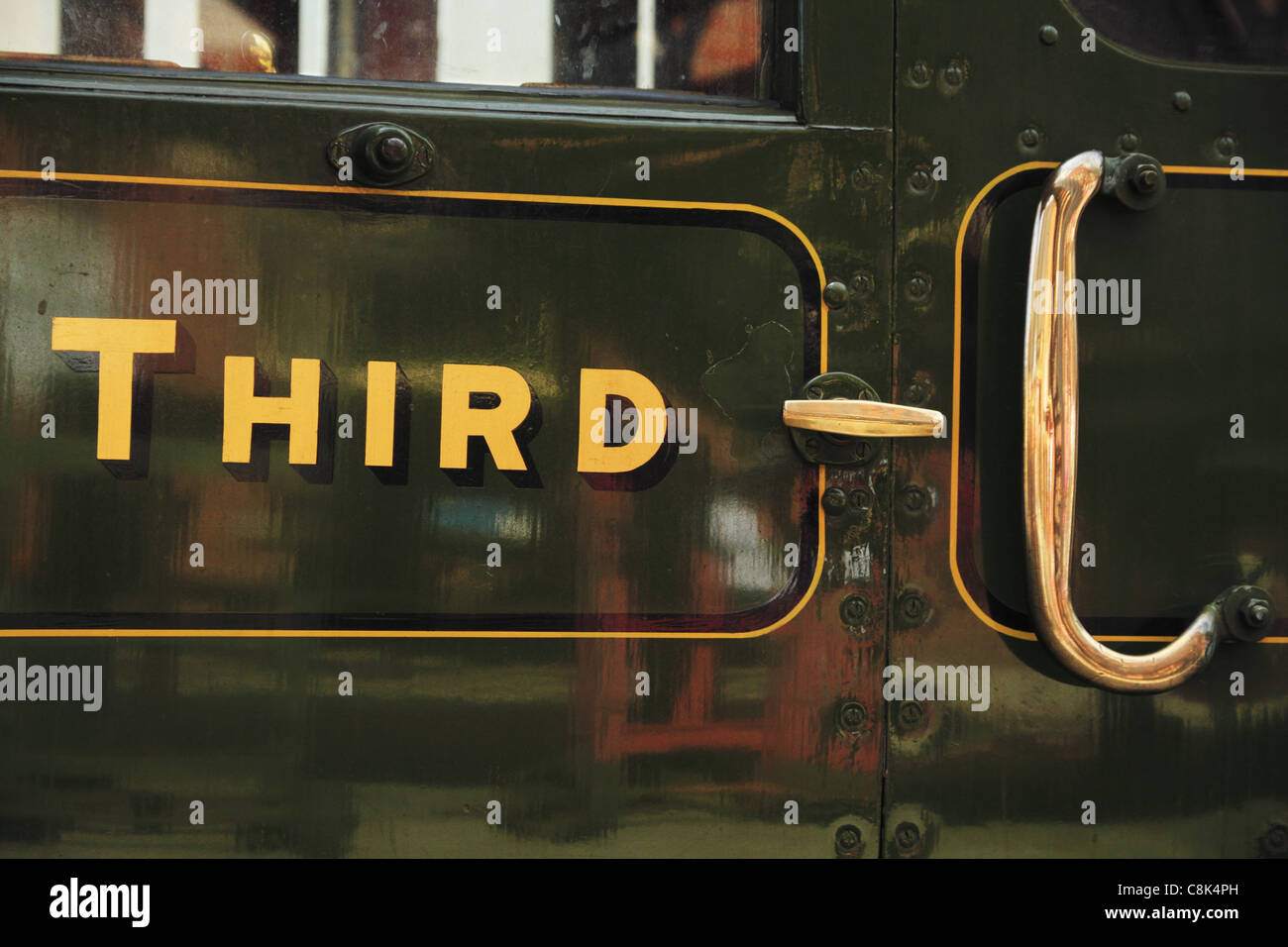 A third class sign on an old railway carriage door at the Bluebell ...