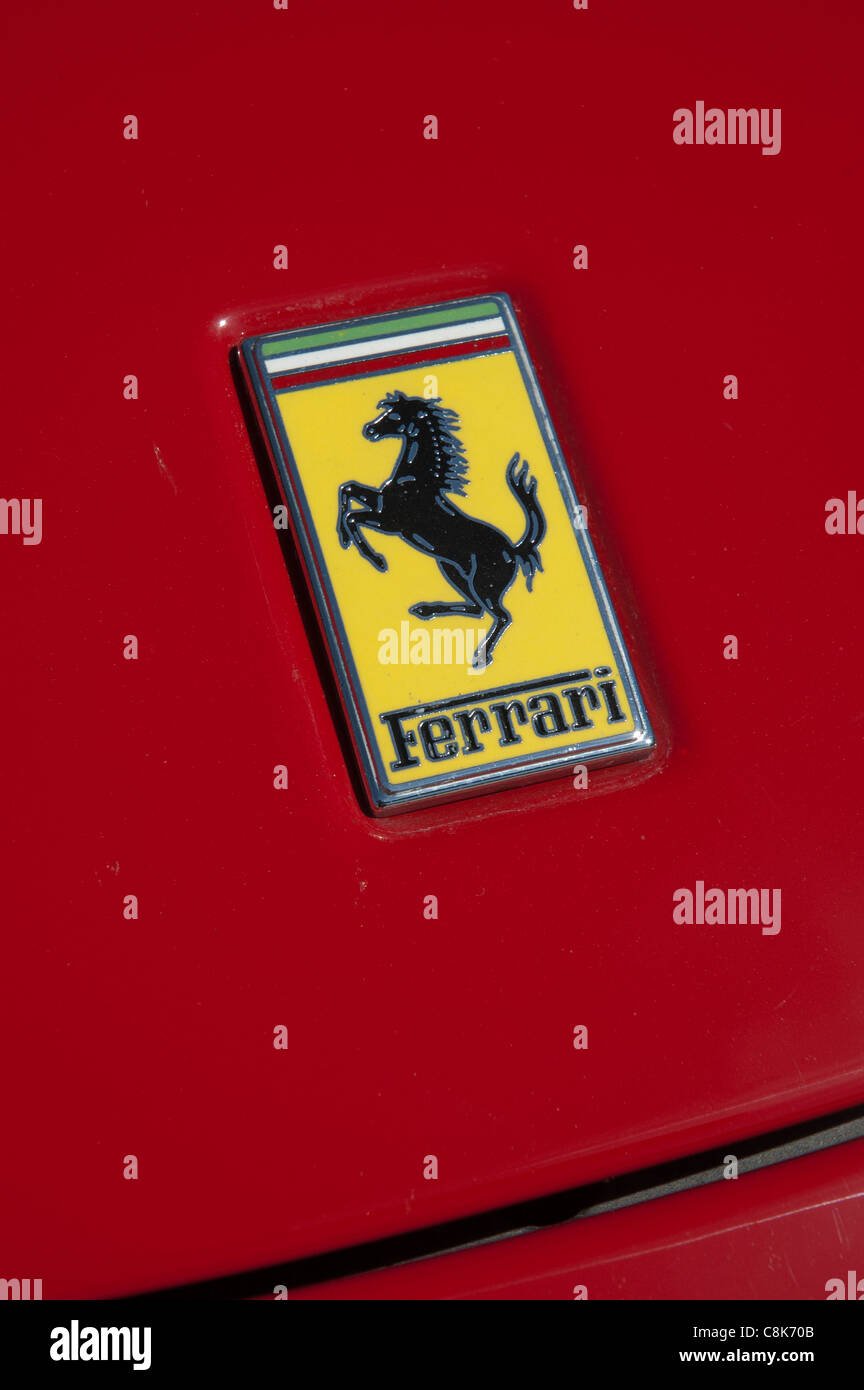 The Ferrari symbol on a red car Stock Photo - Alamy