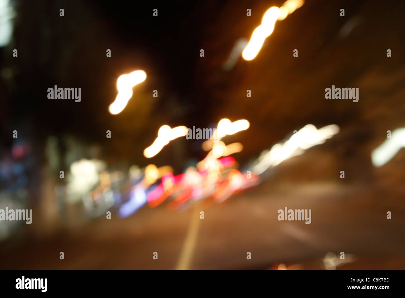Blurry night city lights from a car while driving Stock Photo - Alamy