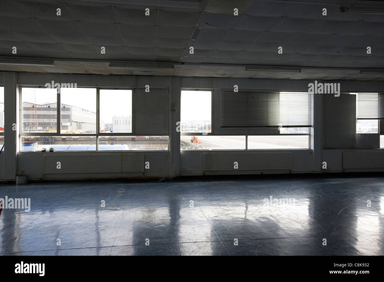 empty abandoned office space in an old factory warehouse unit belfast ...