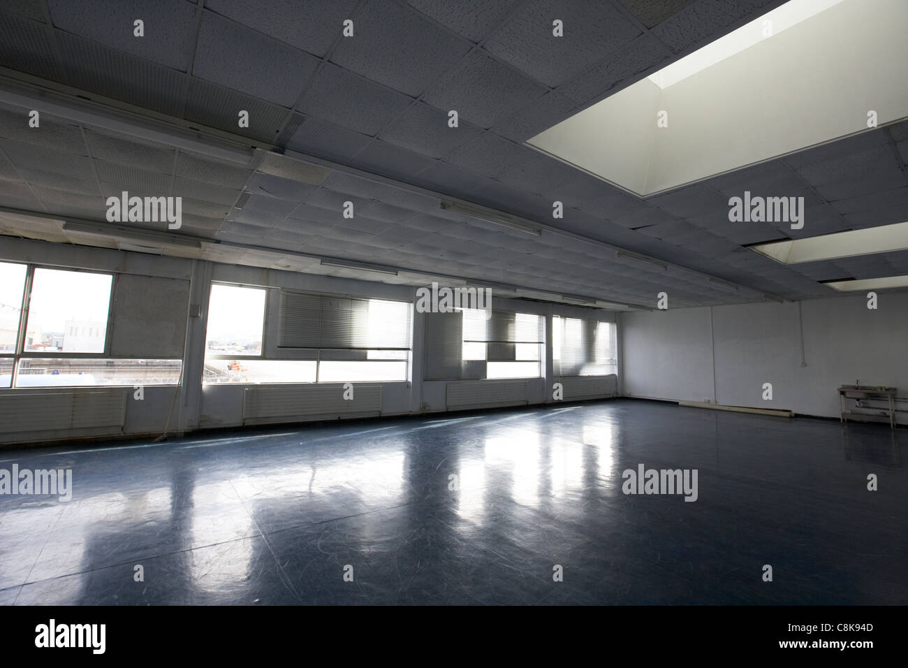 empty abandoned office space in an old factory warehouse unit belfast ...