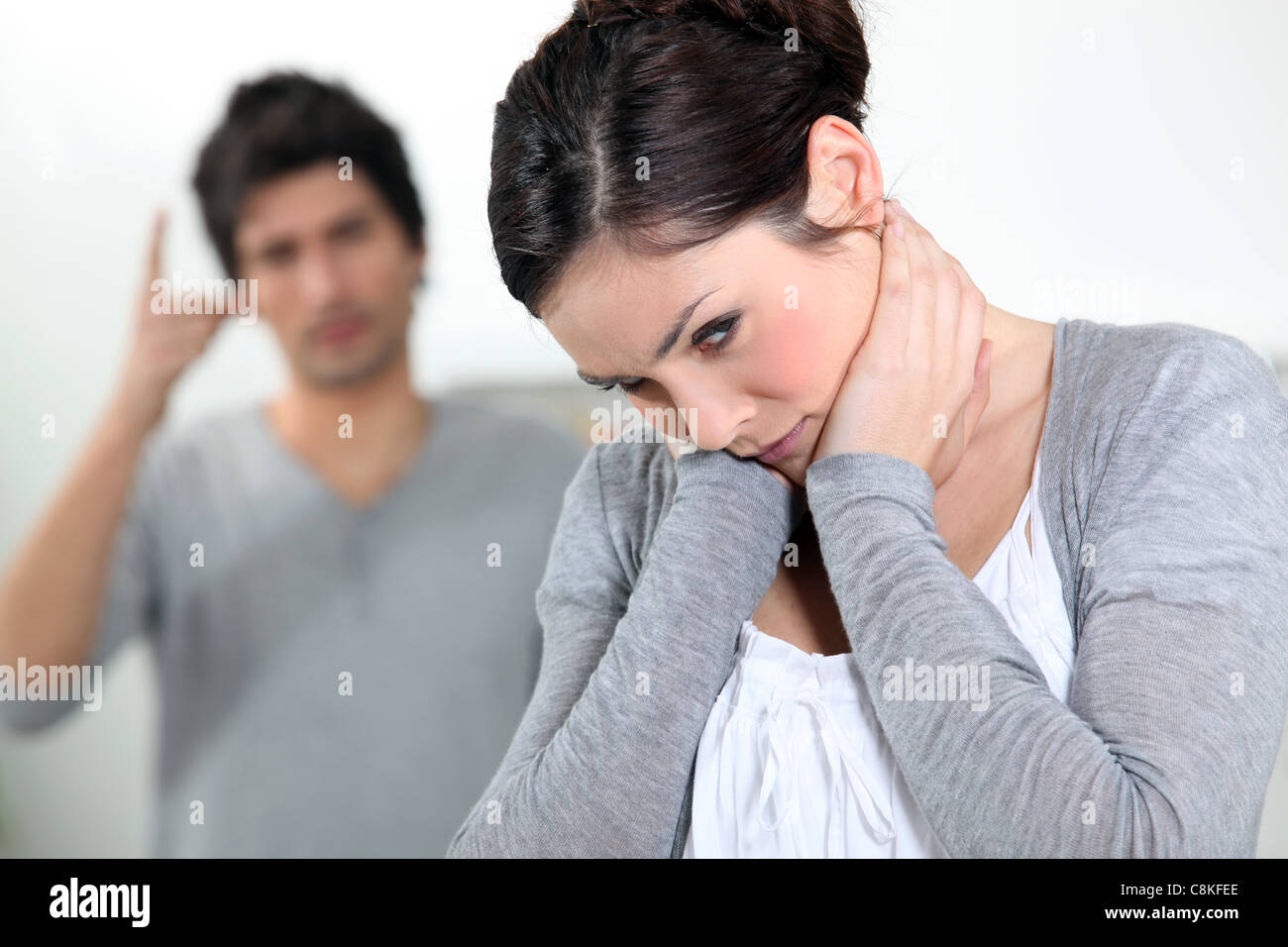 Young woman looking desperate and afflicted Stock Photo - Alamy