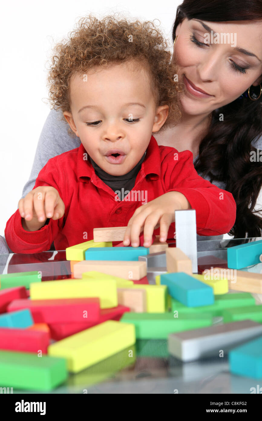 Child with blocks hi-res stock photography and images - Alamy