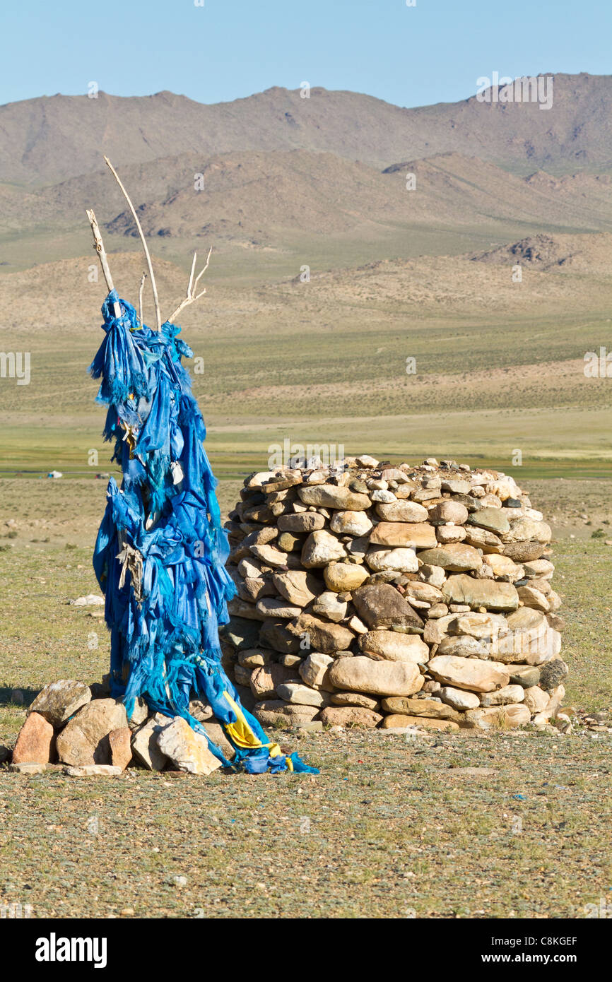 Ovoo Buddhist or Shaman shrine in Mongolia desert Stock Photo - Alamy