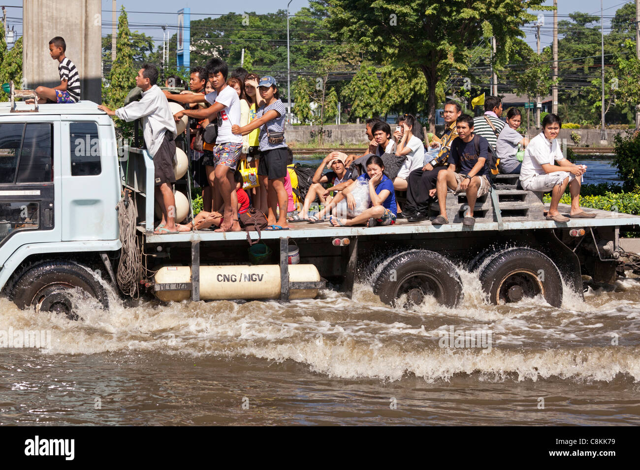 People escaping on a truck from flooded areas, Bangkok, Thailand Stock ...